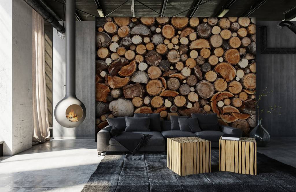 Behang met gestapelde boomstammen - Fotobehang