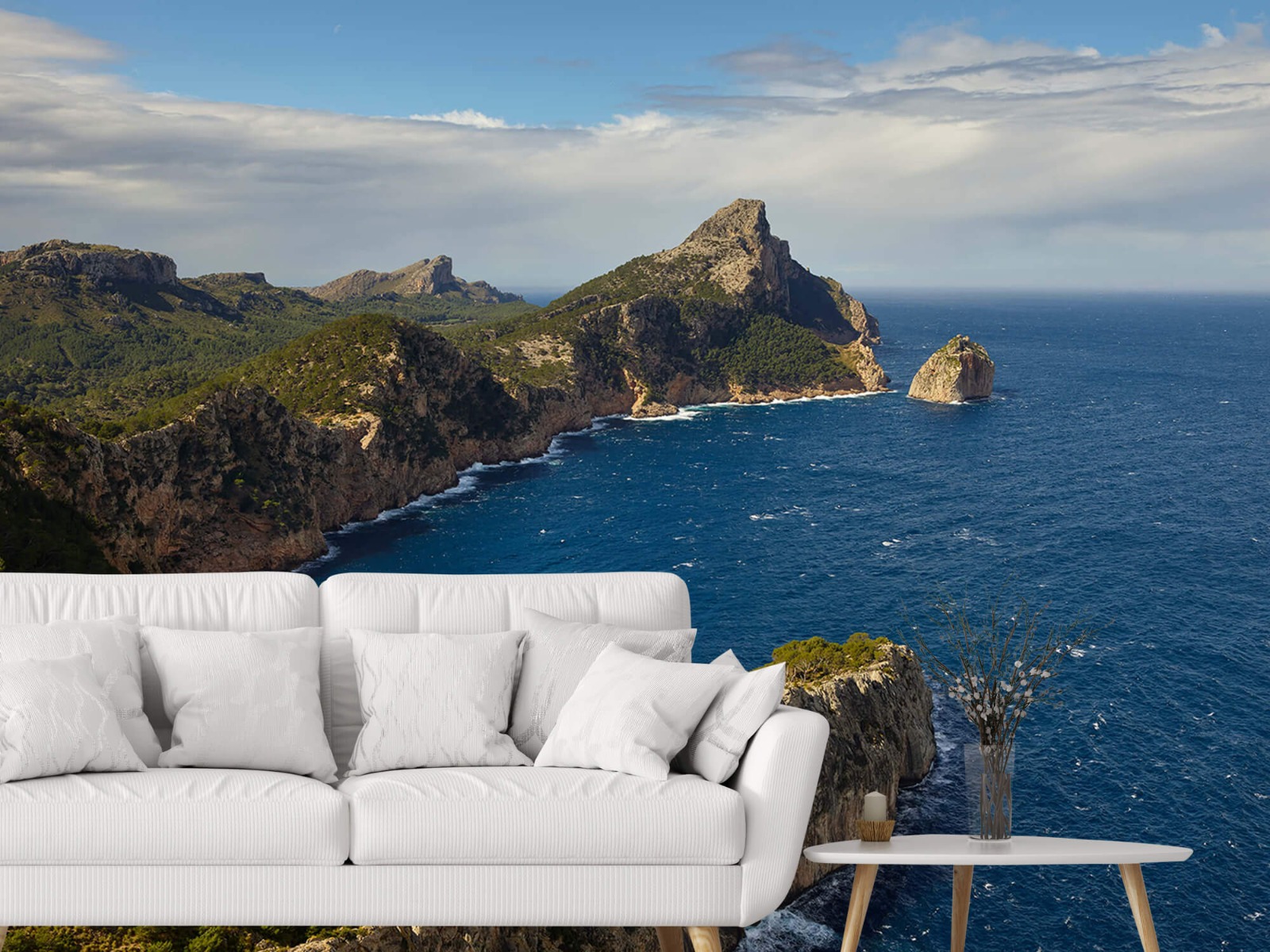 Uitlopende rots in zee - Fotobehang